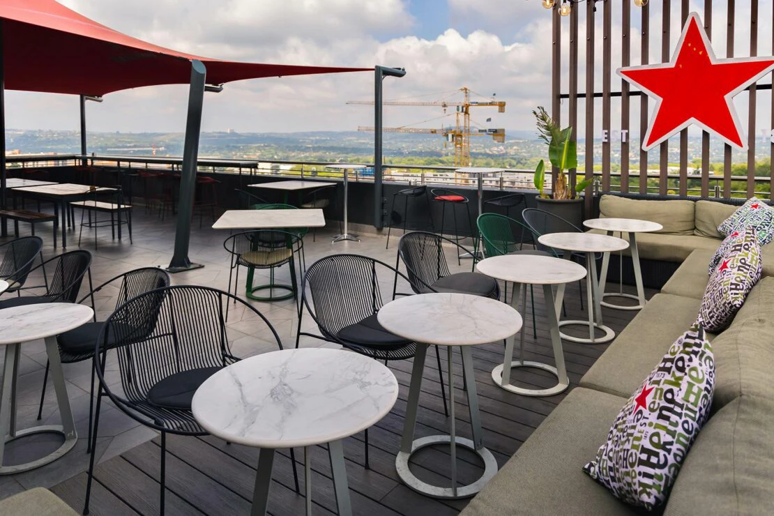 A bold rooftop bar in the heart of Rosebank enhanced by Dekton surfaces ...
