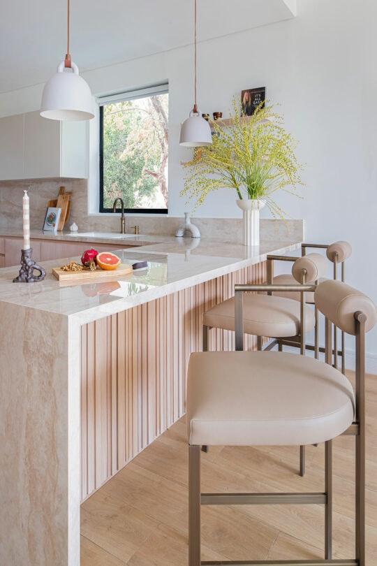 Dekton Arga creates an elegant atmosphere in this open plan kitchen ...