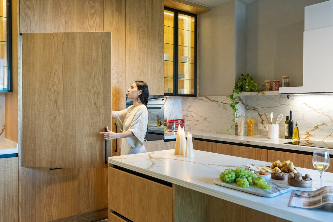 A spacious, modern and organic kitchen featuring wood and Dekton ...