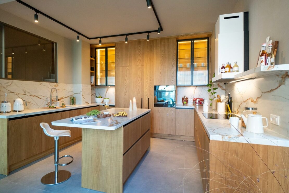 A spacious, modern and organic kitchen featuring wood and Dekton ...