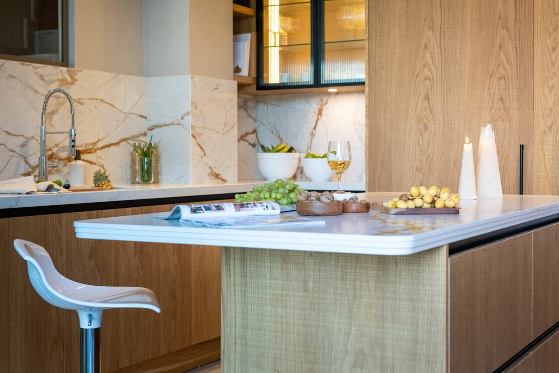 A spacious, modern and organic kitchen featuring wood and Dekton ...