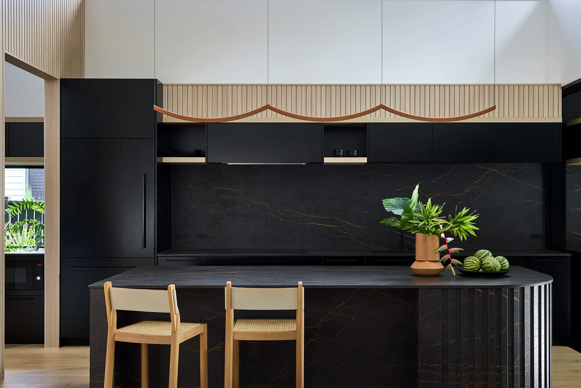 Materiality transforms an indoor kitchen into an outdoor space ...