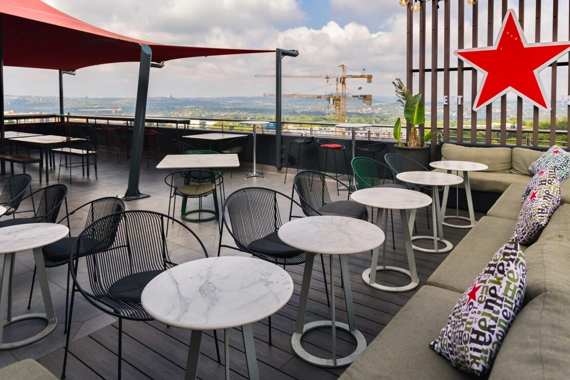 A bold rooftop bar in the heart of Rosebank enhanced by Dekton surfaces ...