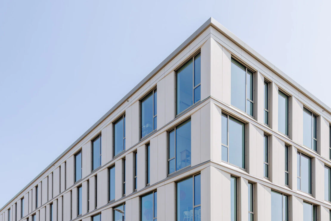 Only two façade elements (recessed windows and slanted Dekton panels ...