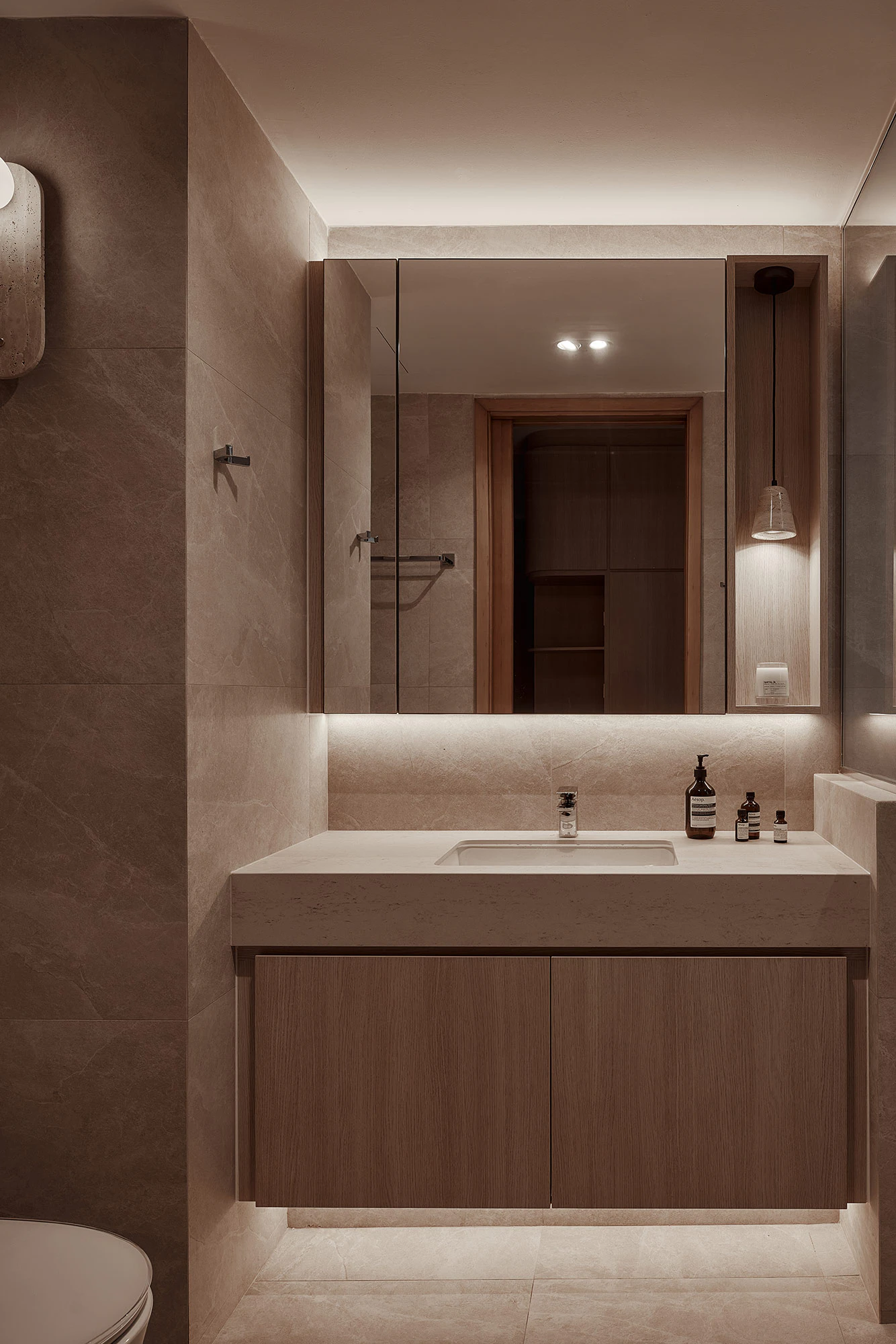 A minimalist home with earthy tones harmoniously blended with Dekton ...