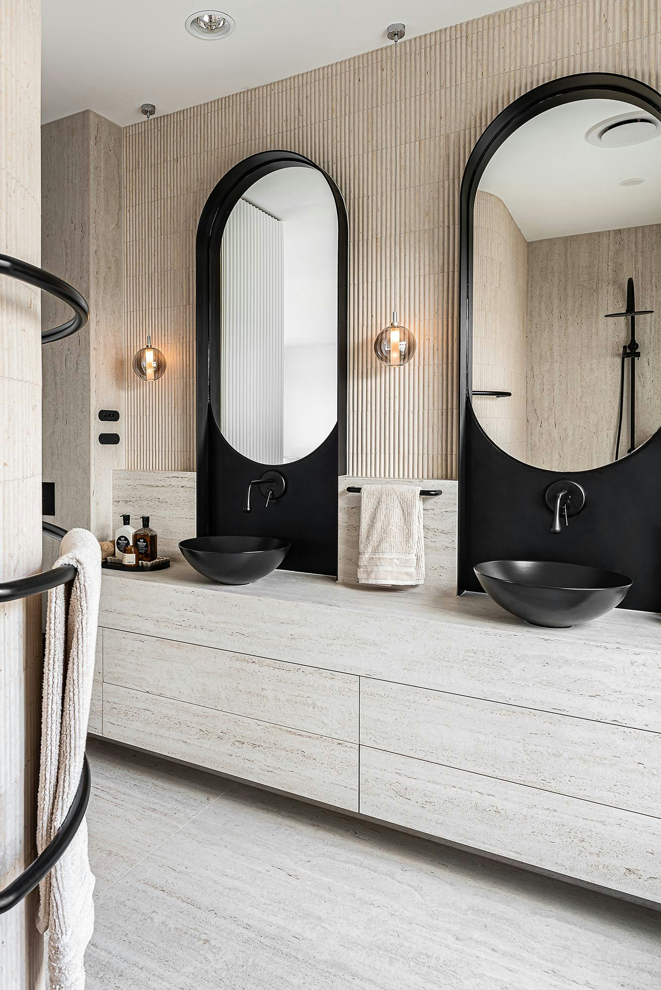 Natural light partners with Dekton Marmorio to create an enveloping, sophisticated bathroom ...
