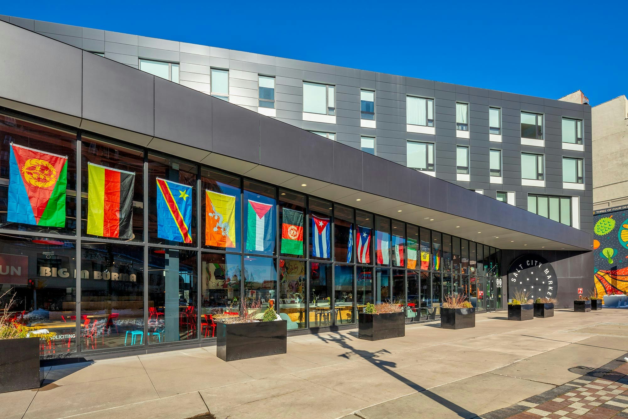 Dekton Domoos adorns the facade of the mixed-use Salt City Market ...