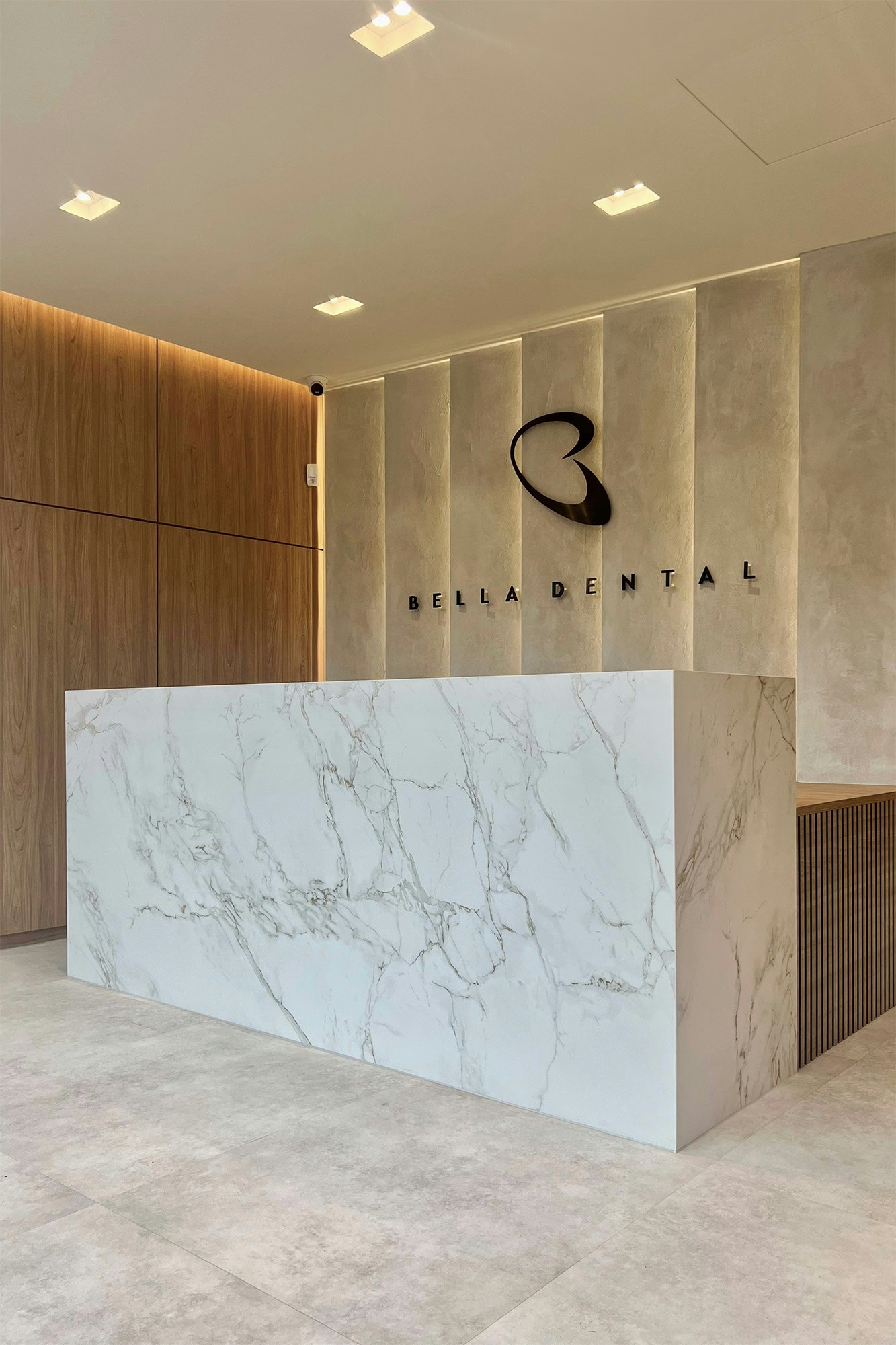 A Dekton reception desk to mark the decoration of a high quality dental ...