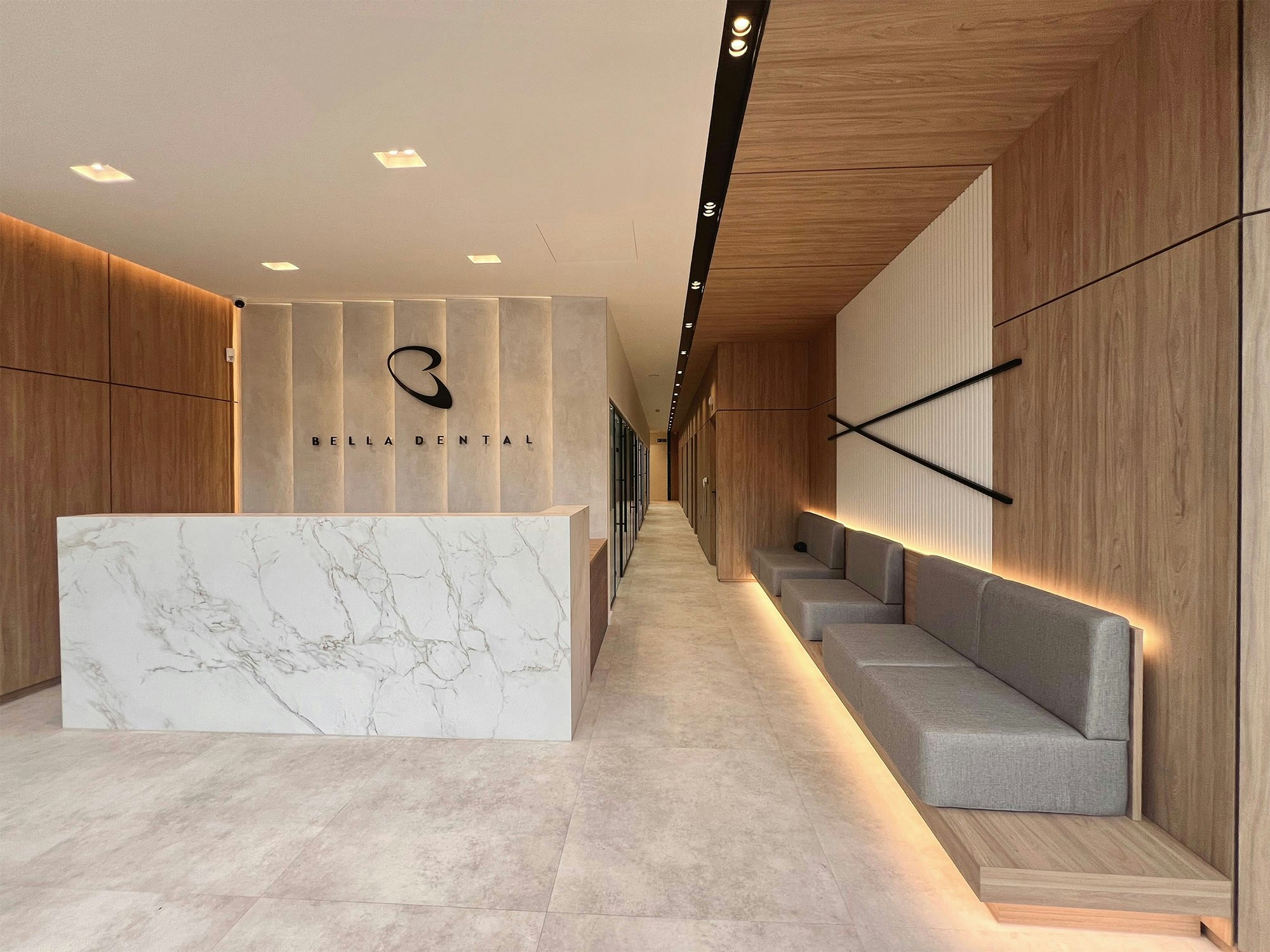 A Dekton reception desk to mark the decoration of a high quality dental ...