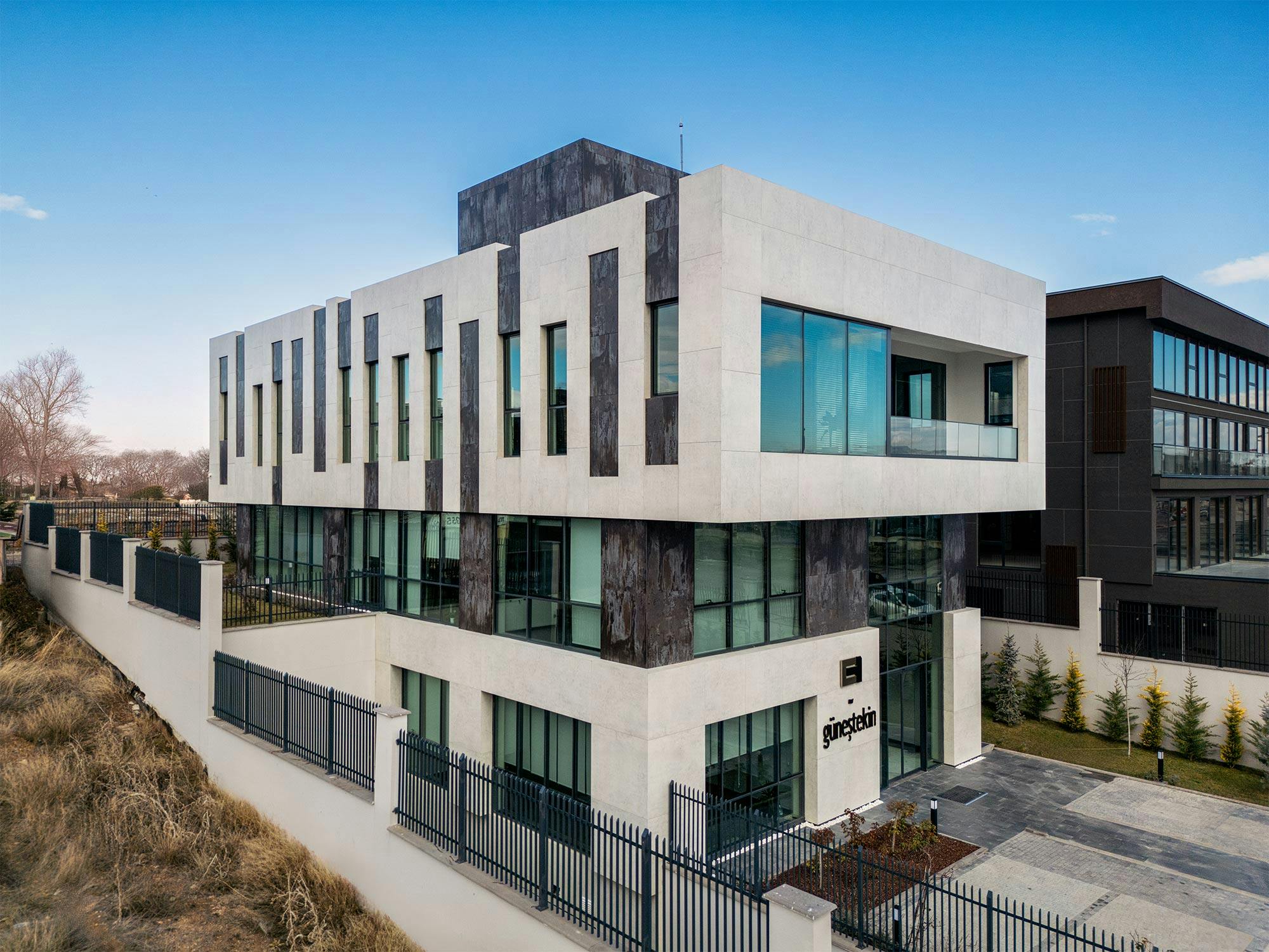 House wrapped in forest with Dekton Soke and wood - Cosentino USA