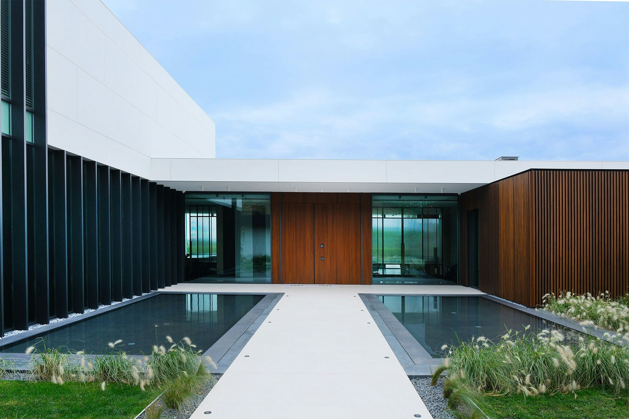 House wrapped in forest with Dekton Soke and wood - Cosentino USA