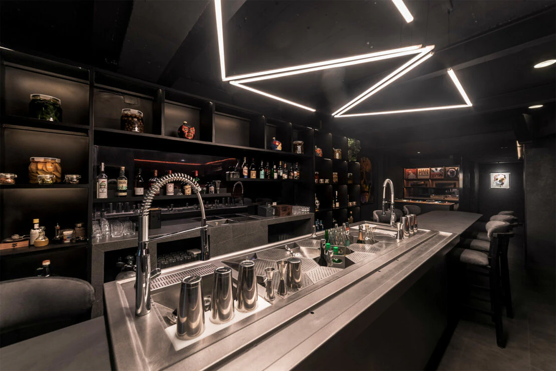 Antesala Bar, a modern minimalist cocktail bar dominated by light ...