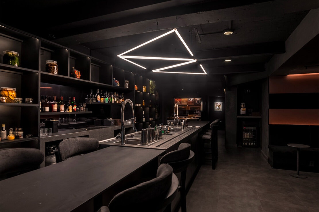 Antesala Bar, a modern minimalist cocktail bar dominated by light ...