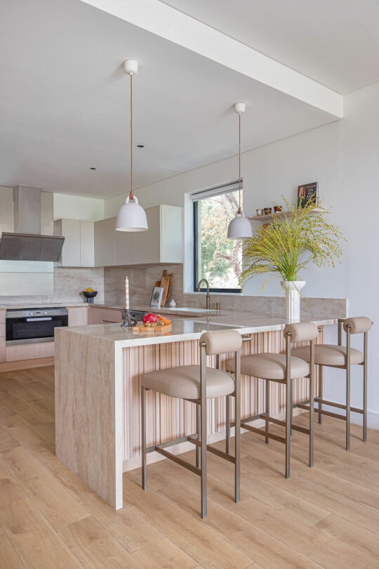 Dekton Arga creates an elegant atmosphere in this open plan kitchen ...