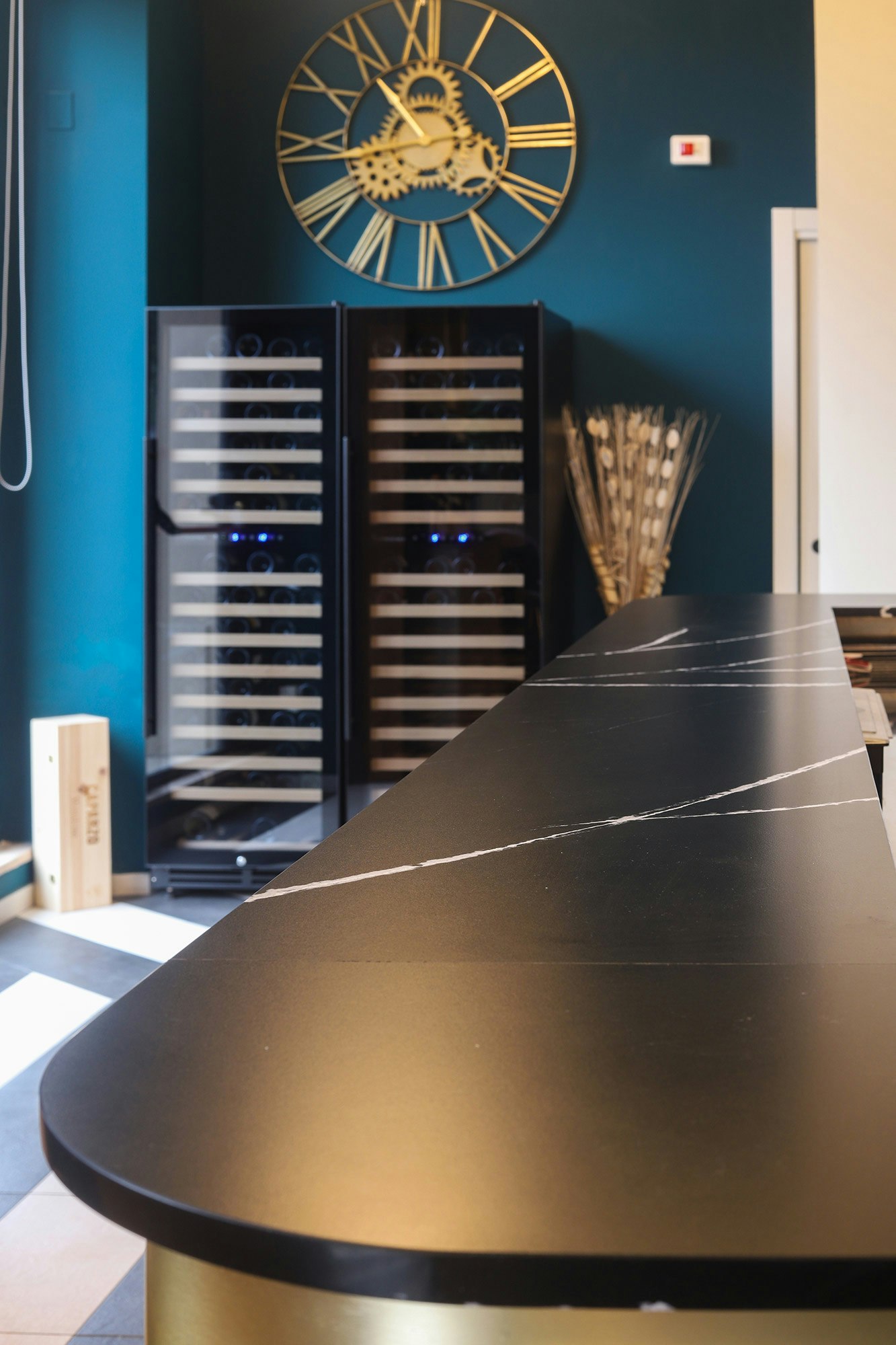 A wine bar with an elegant bar counter that attracts all eyes (and ...