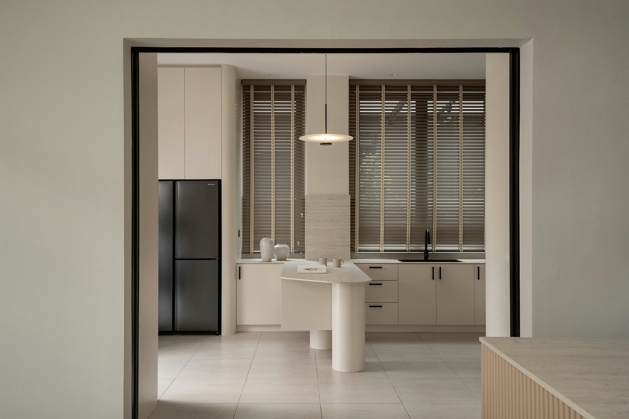 This serene kitchen enjoys all the beauty of Italian natural stone ...