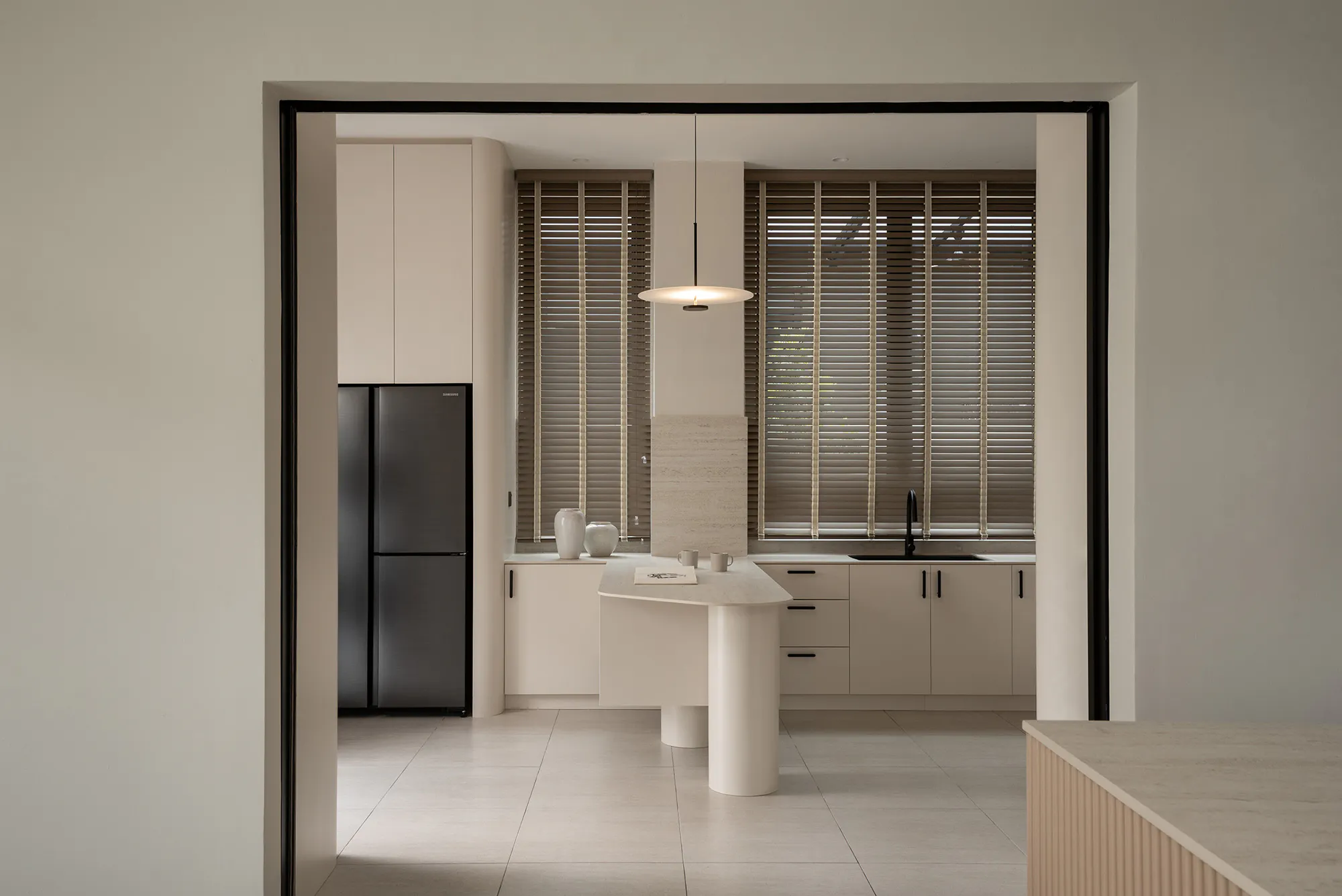This serene kitchen enjoys all the beauty of Italian natural stone ...
