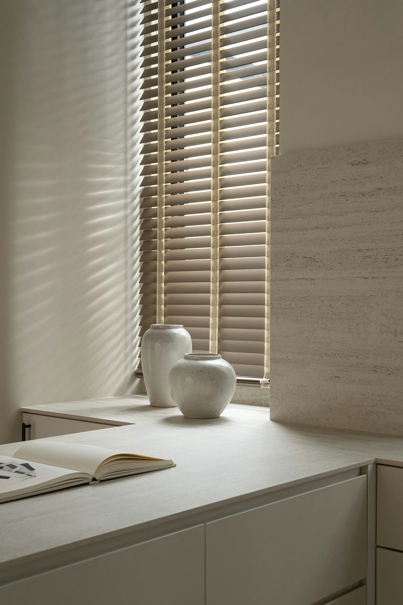 This serene kitchen enjoys all the beauty of Italian natural stone ...