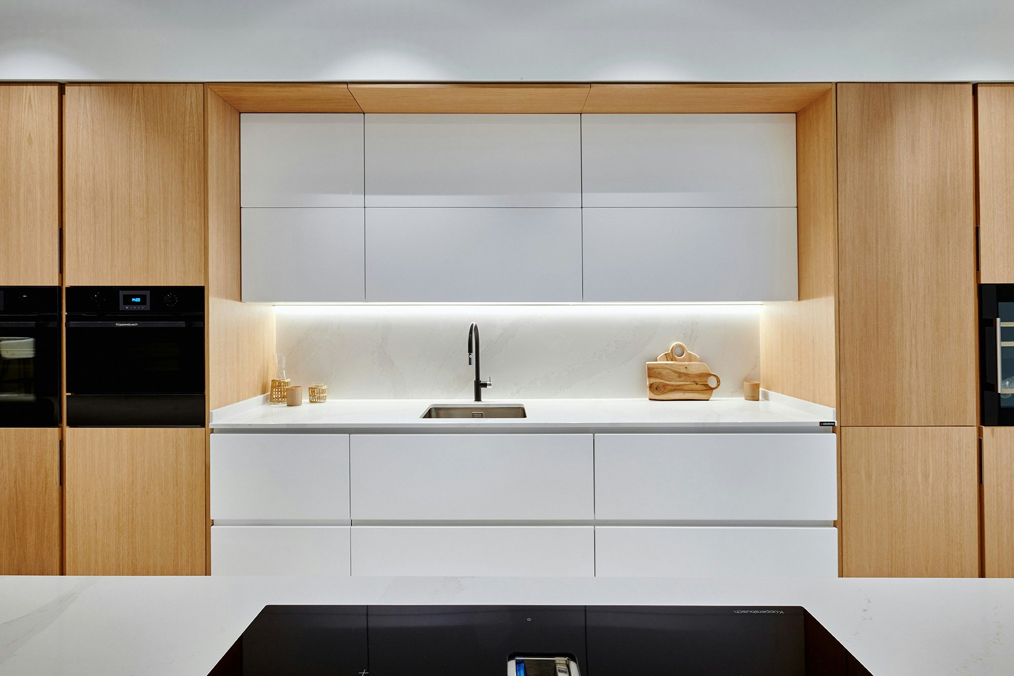 Dekton brightens up a small kitchen and creates a sense of continuity ...