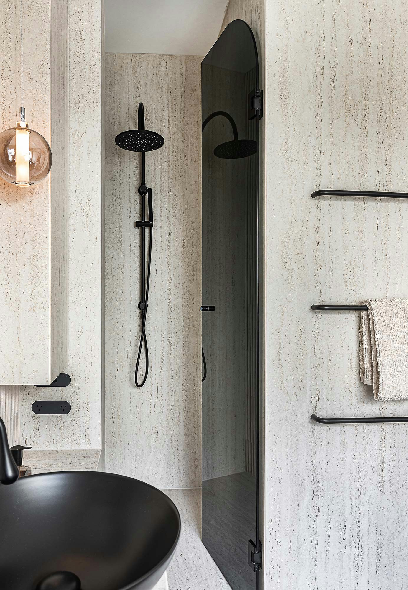 Natural light partners with Dekton Marmorio to create an enveloping, sophisticated bathroom ...