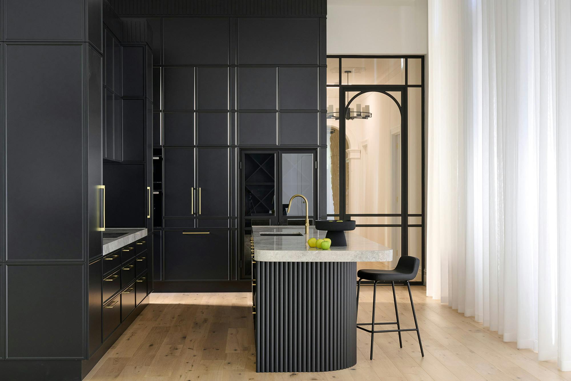 A dialogue between the fireplace and the kitchens in this Australian home with Scalea by ...