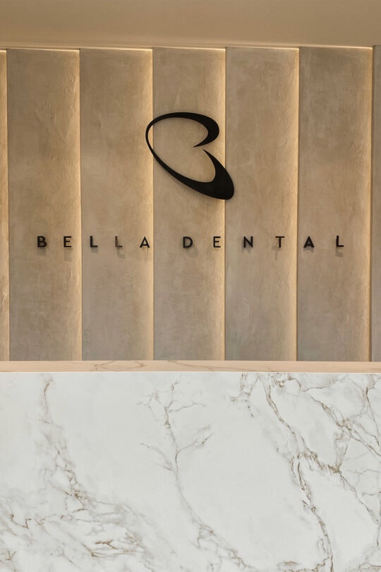 A Dekton reception desk to mark the decoration of a high quality dental ...