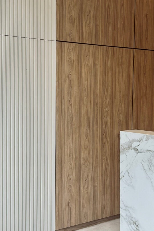 A Dekton reception desk to mark the decoration of a high quality dental ...