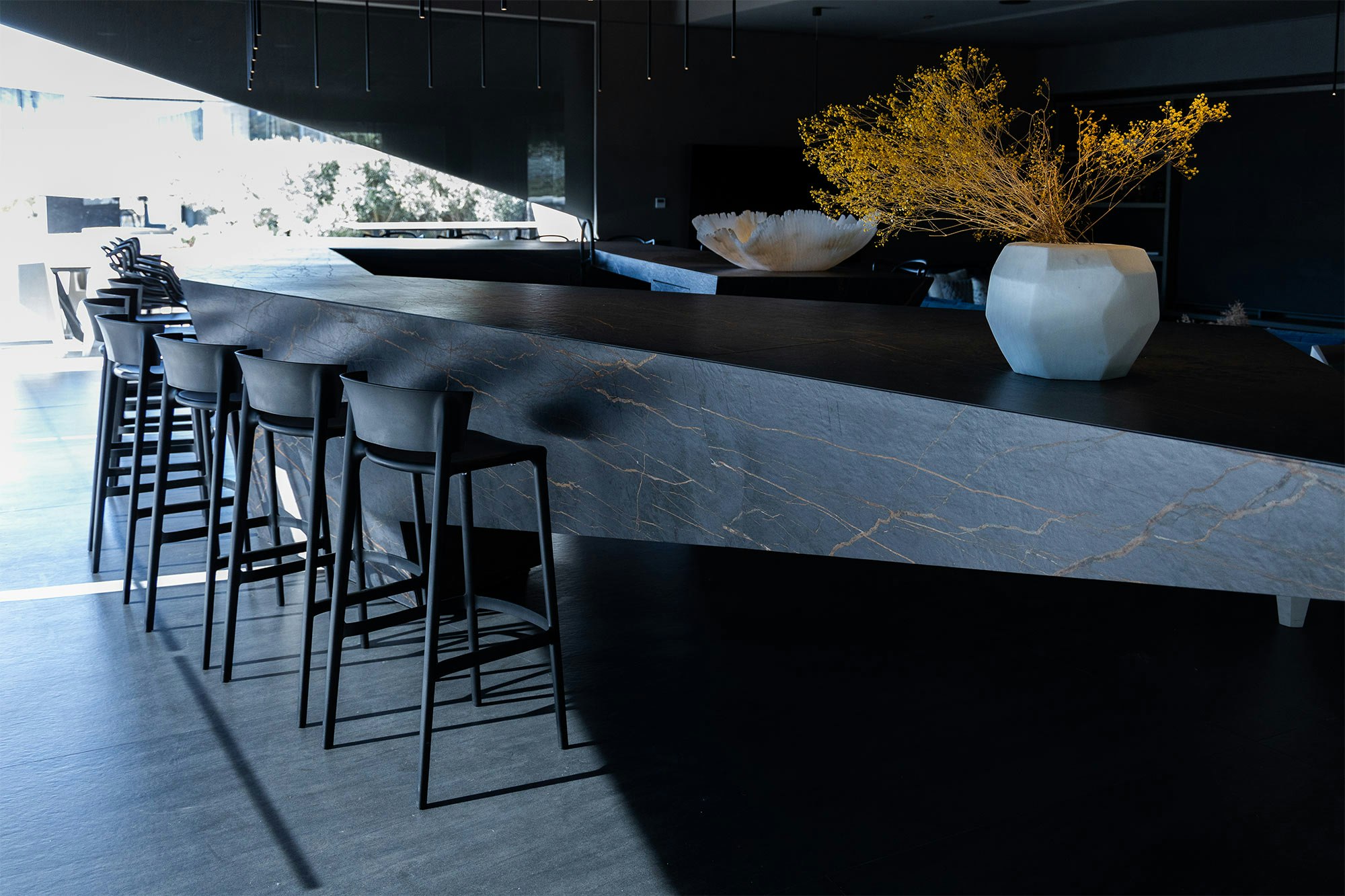 A dialogue between the fireplace and the kitchens in this Australian home with Scalea by ...